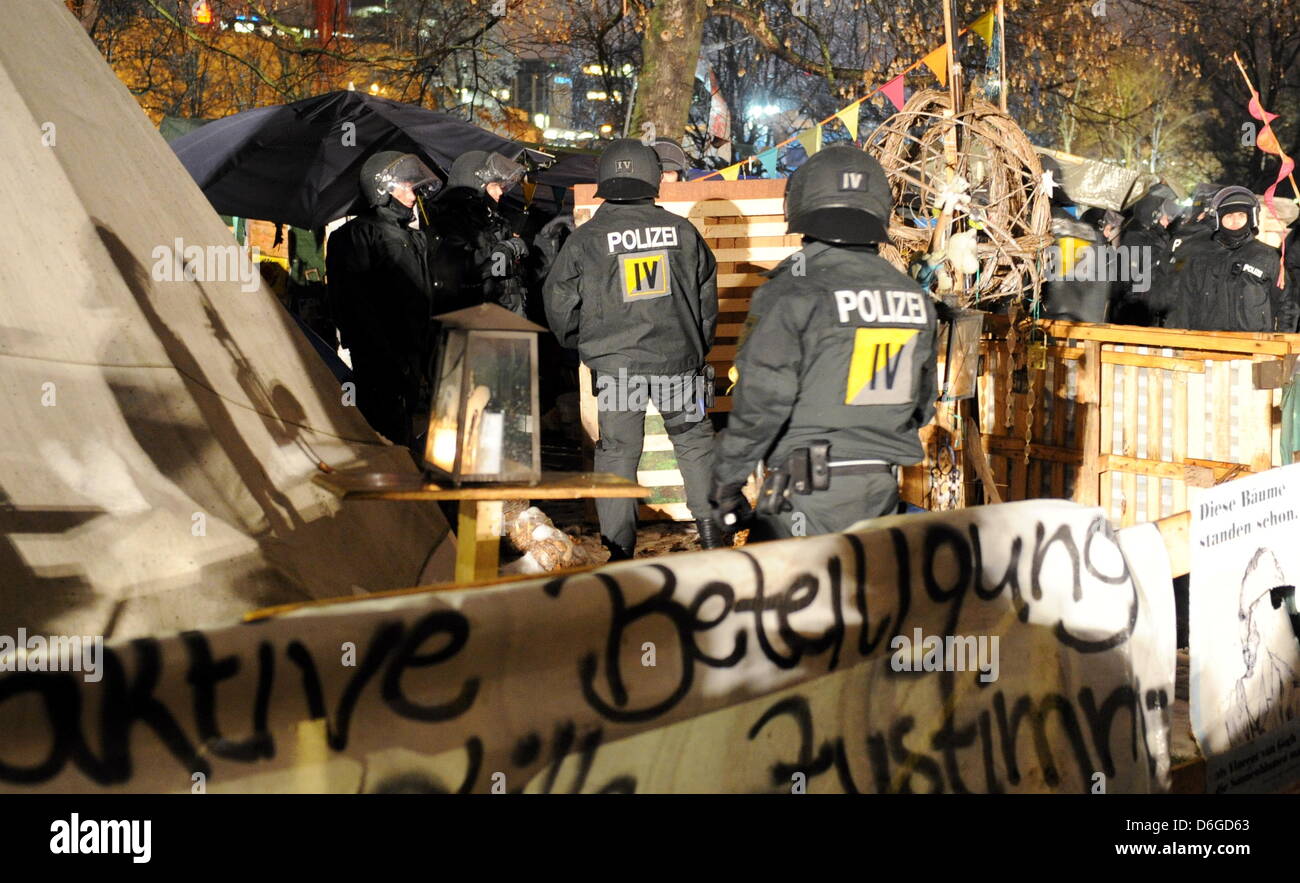 Police officers evict a protest camp erected by opponents of the ...