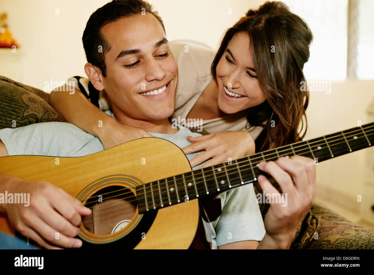 Hugging Guitar High Resolution Stock Photography and Images - Alamy