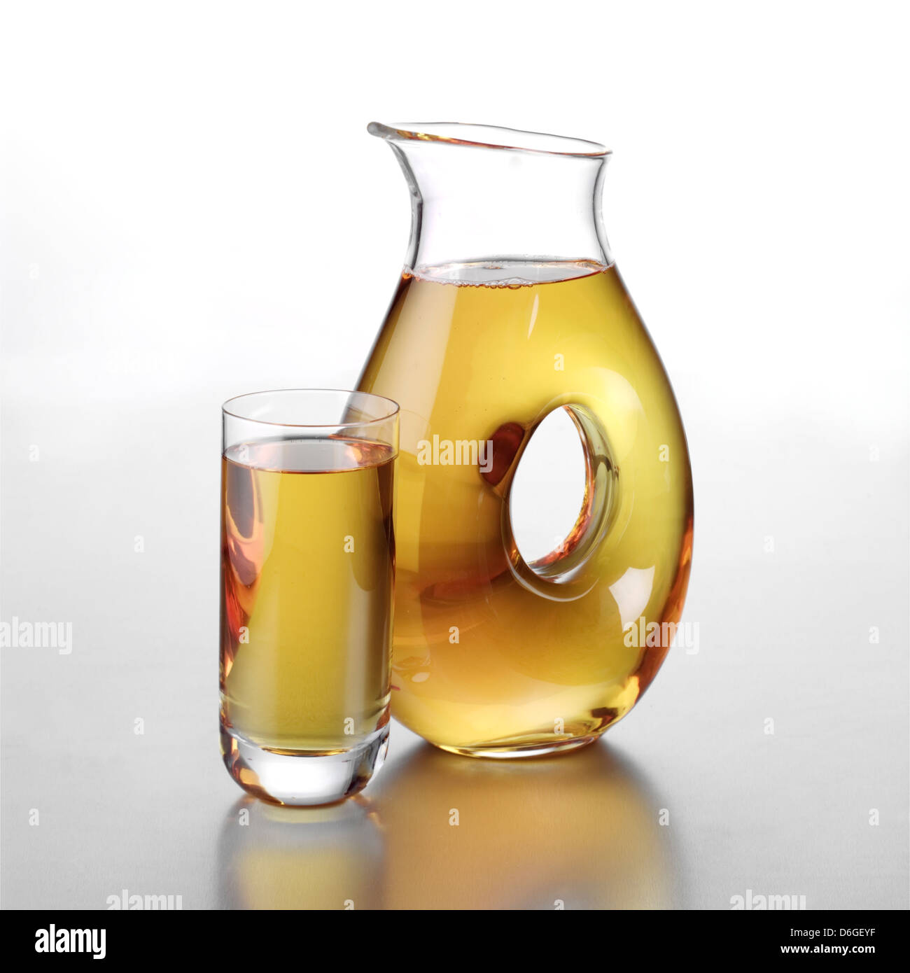 Jug of Apple Juice with a Full Glass Stock Photo - Alamy