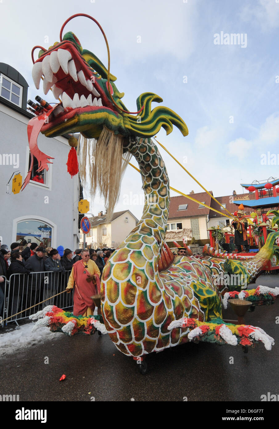 A group takes part in the tradition Chinese Carnival parade with a ...