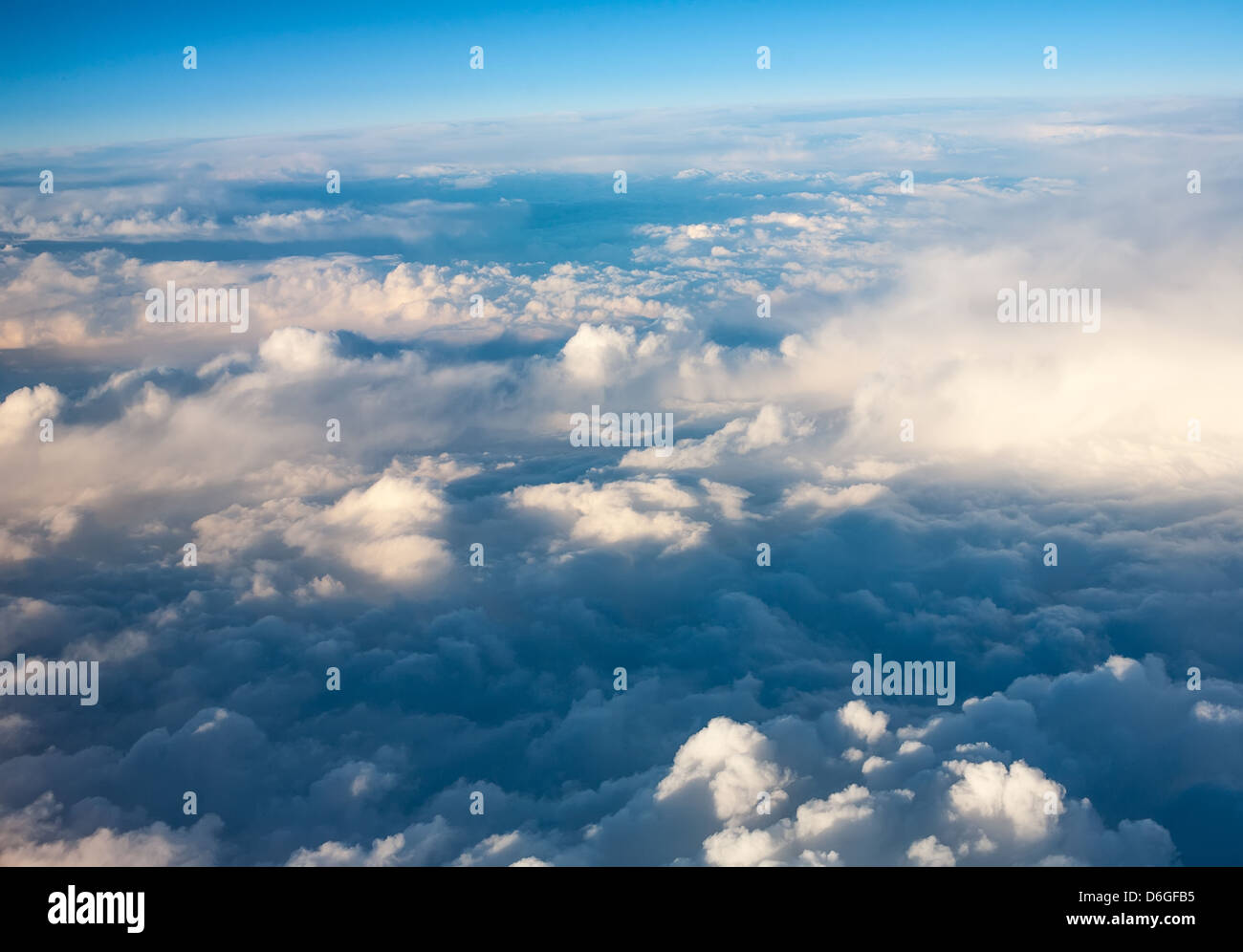 Clouds. Top view from the window of airplane flying in the clouds ...