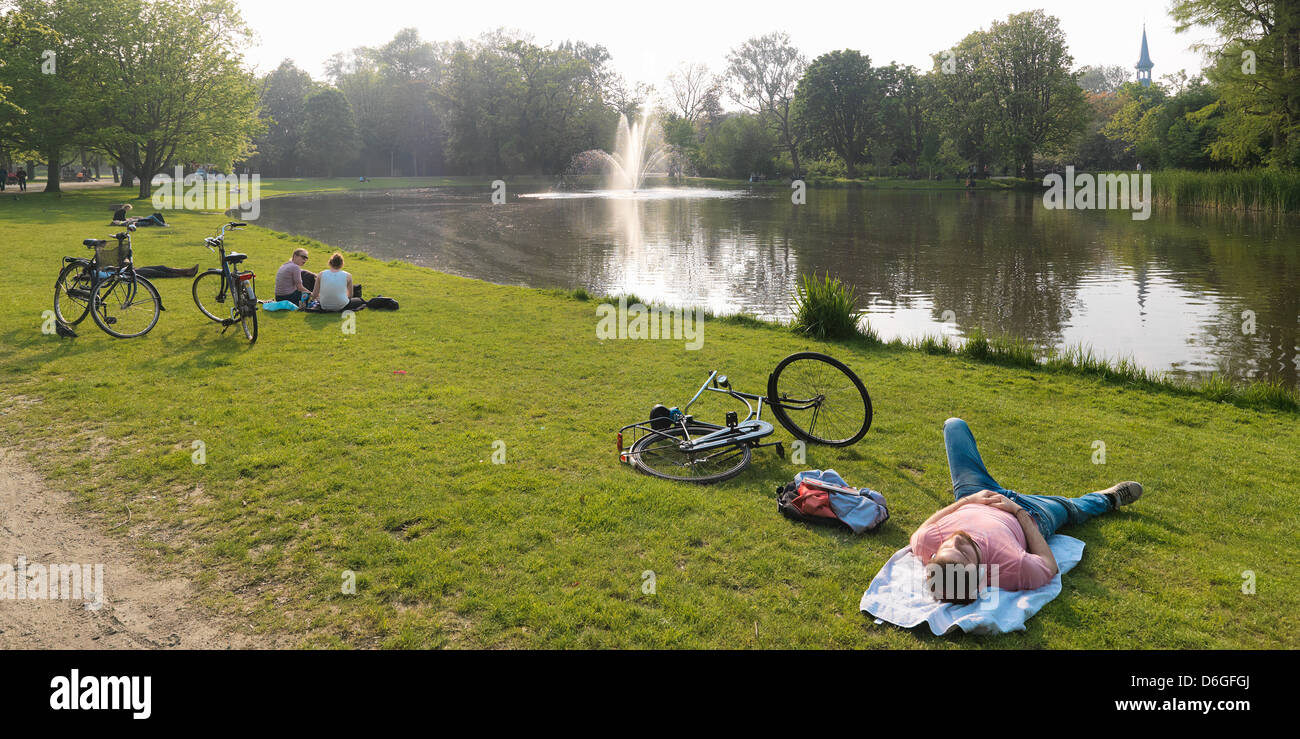 Amsterdam, The Netherlands, visitors to the pond in the Vondelpark ...