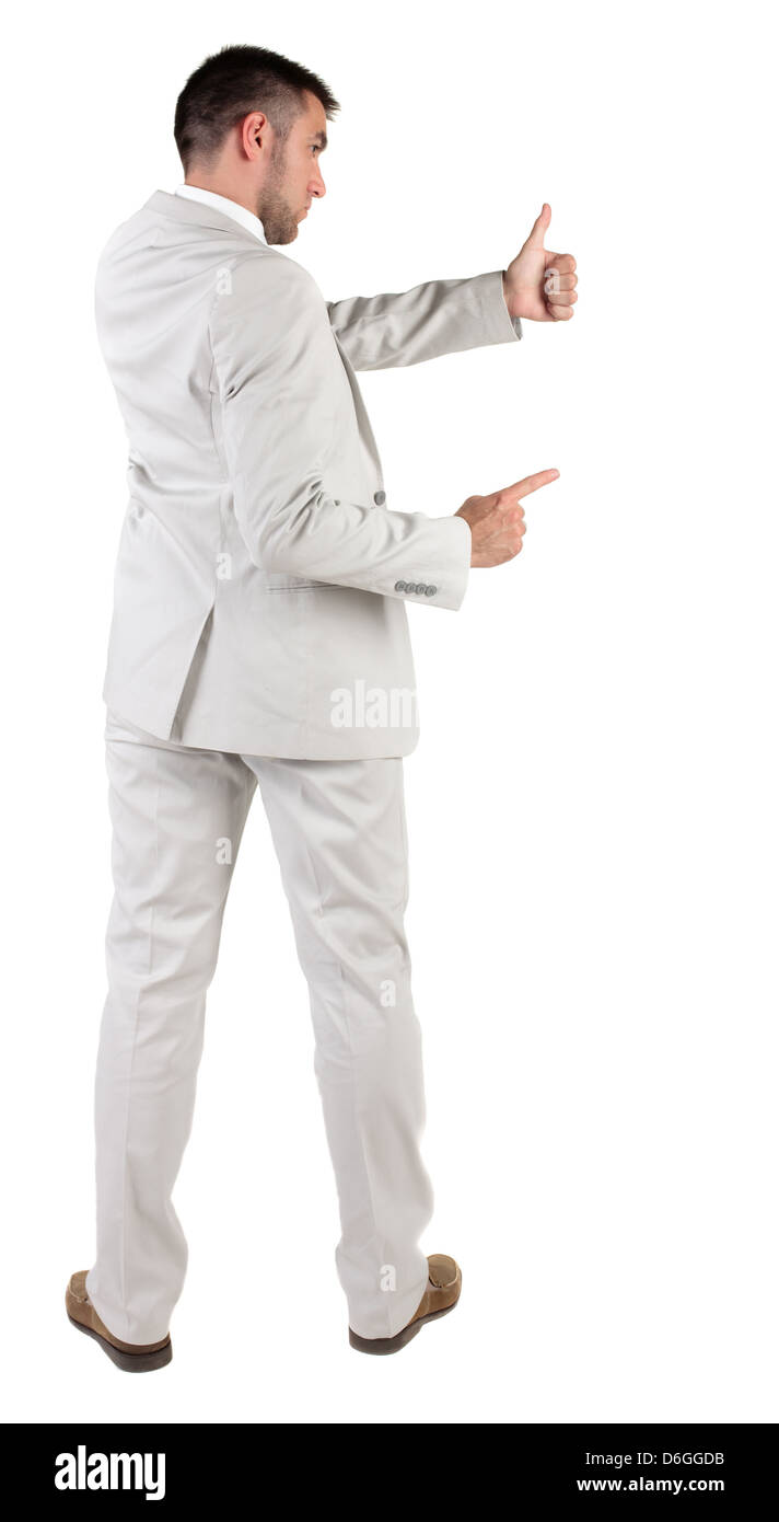 Back view of young business man in white suit going thumb up, isolated ...