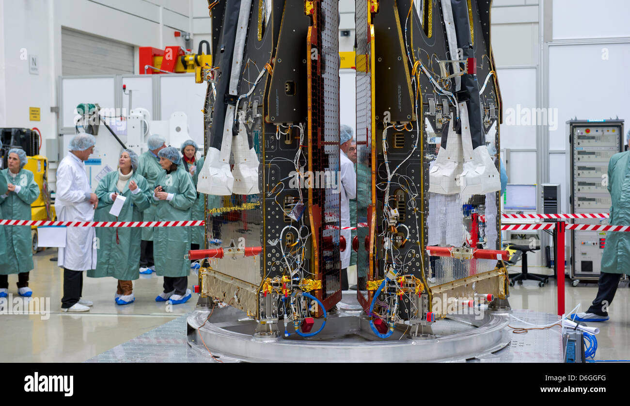 IABG employees inspect the ESA environmental satellite "Swarm" in a ...