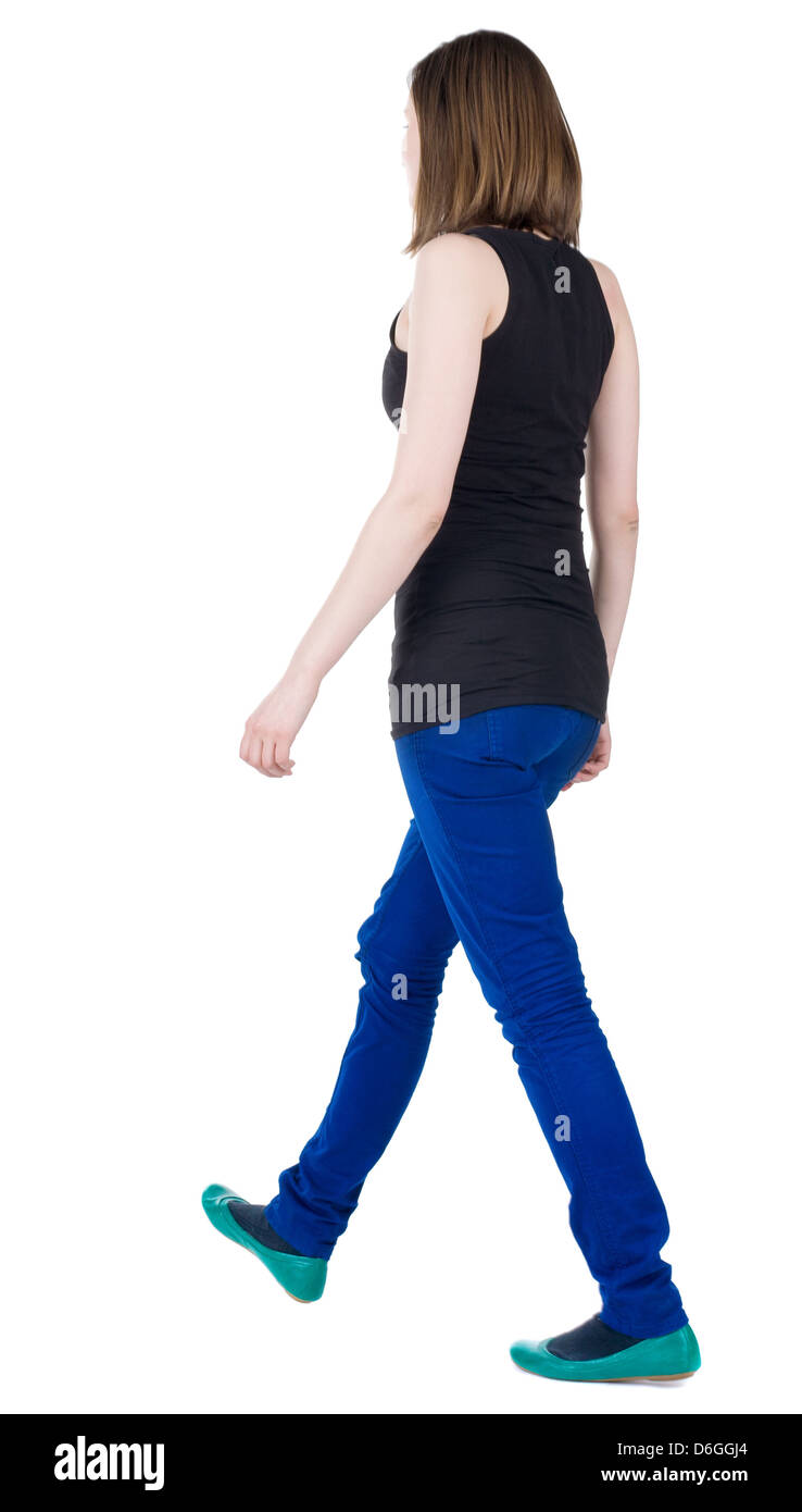 back view of going brunette girl. woman in motion. Rear view people ...