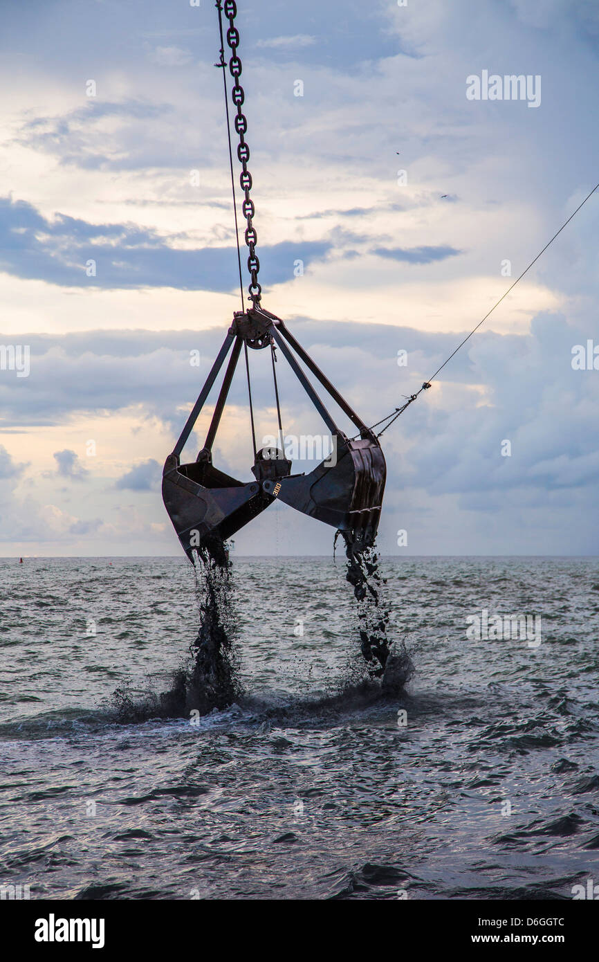 Crane operating in water Stock Photo - Alamy