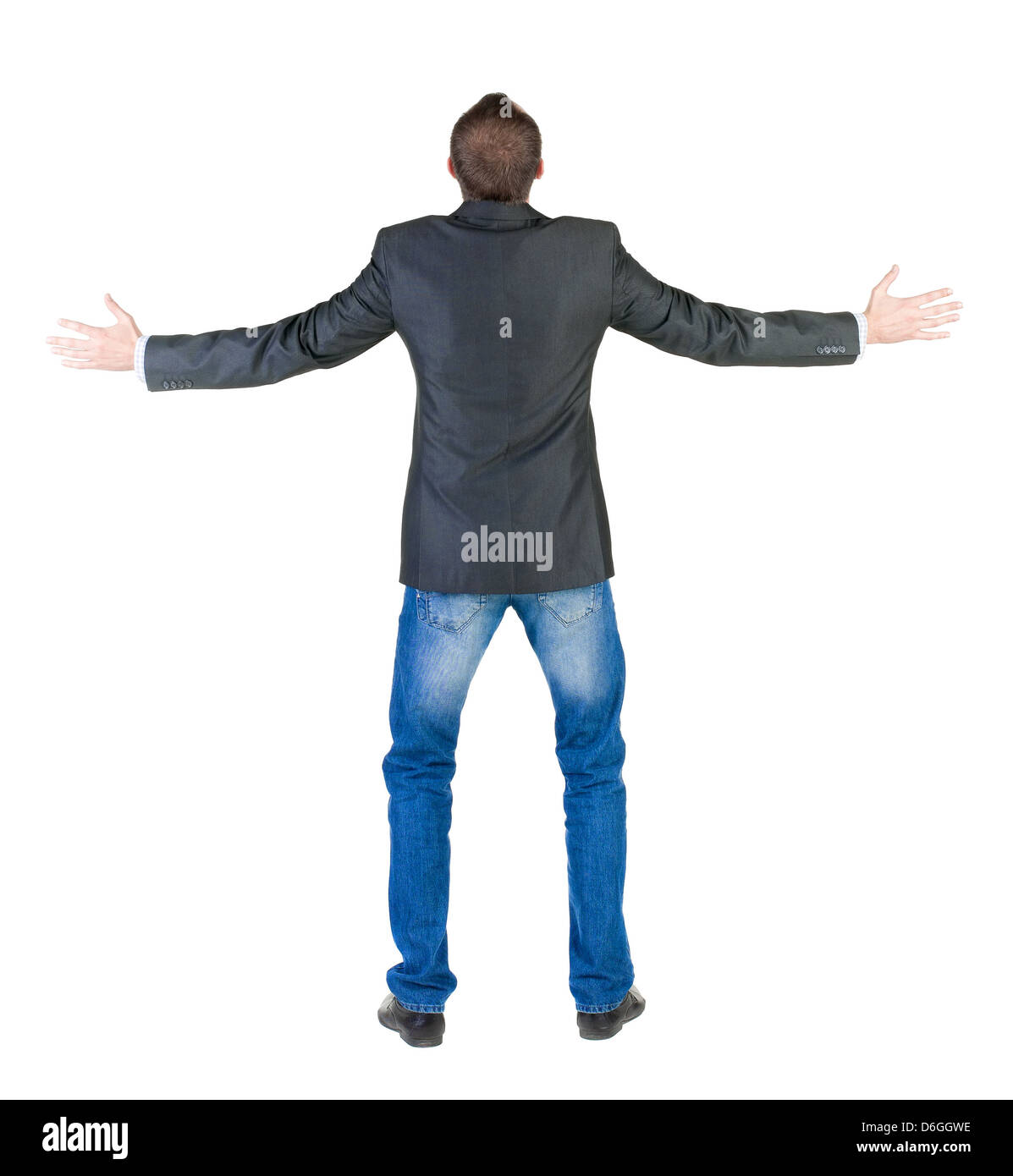 Back view of shocked and scared young business man. Holds hands upwards ...