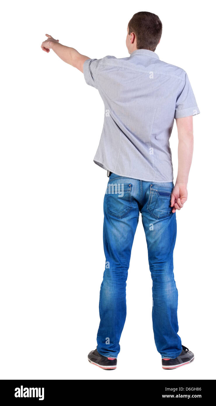 Back view of pointing young men in shirt and jeans. Young guy gesture ...