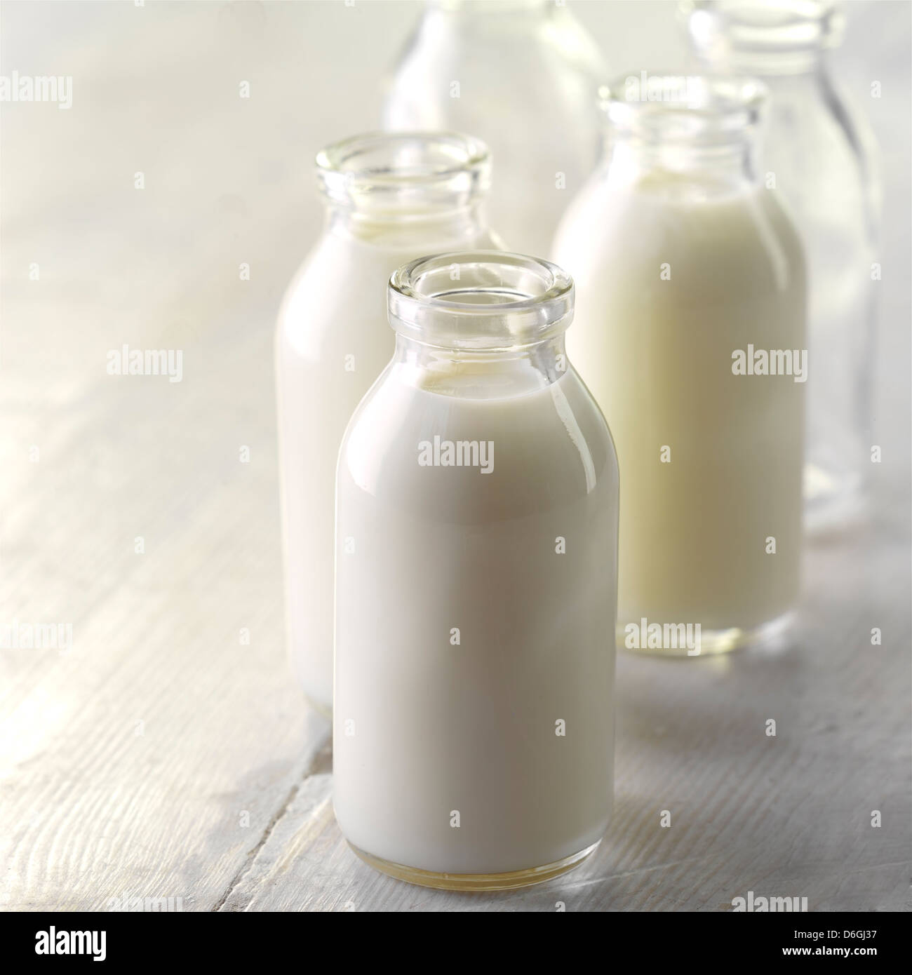 Full and Empty Milk Bottles Stock Photo - Alamy