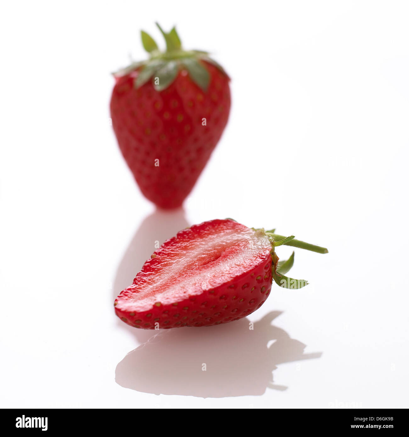 One strawberry and half cut out Cut Out Stock Images & Pictures - Alamy