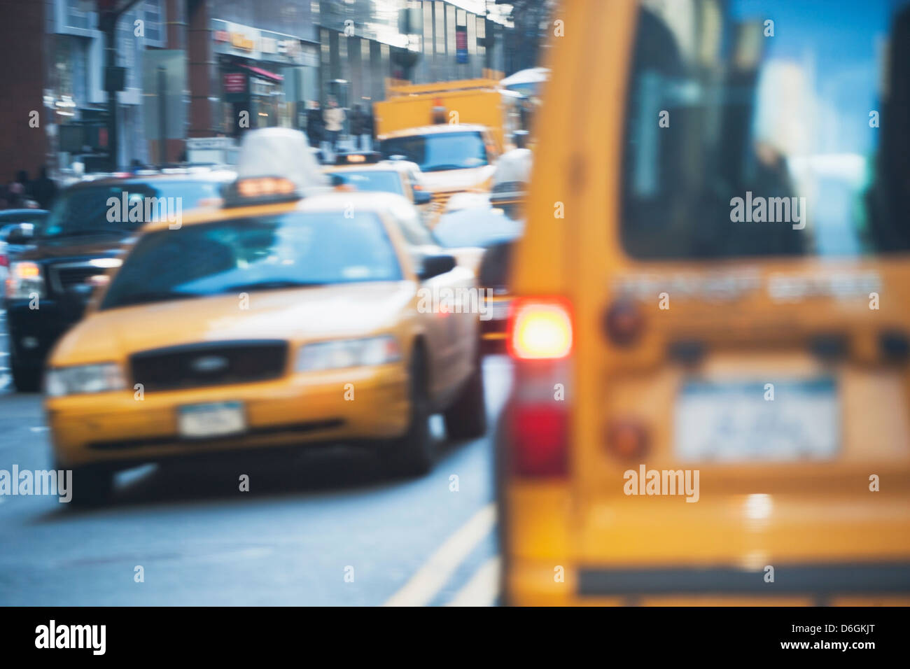 Taxis sitting in city traffic Stock Photo - Alamy