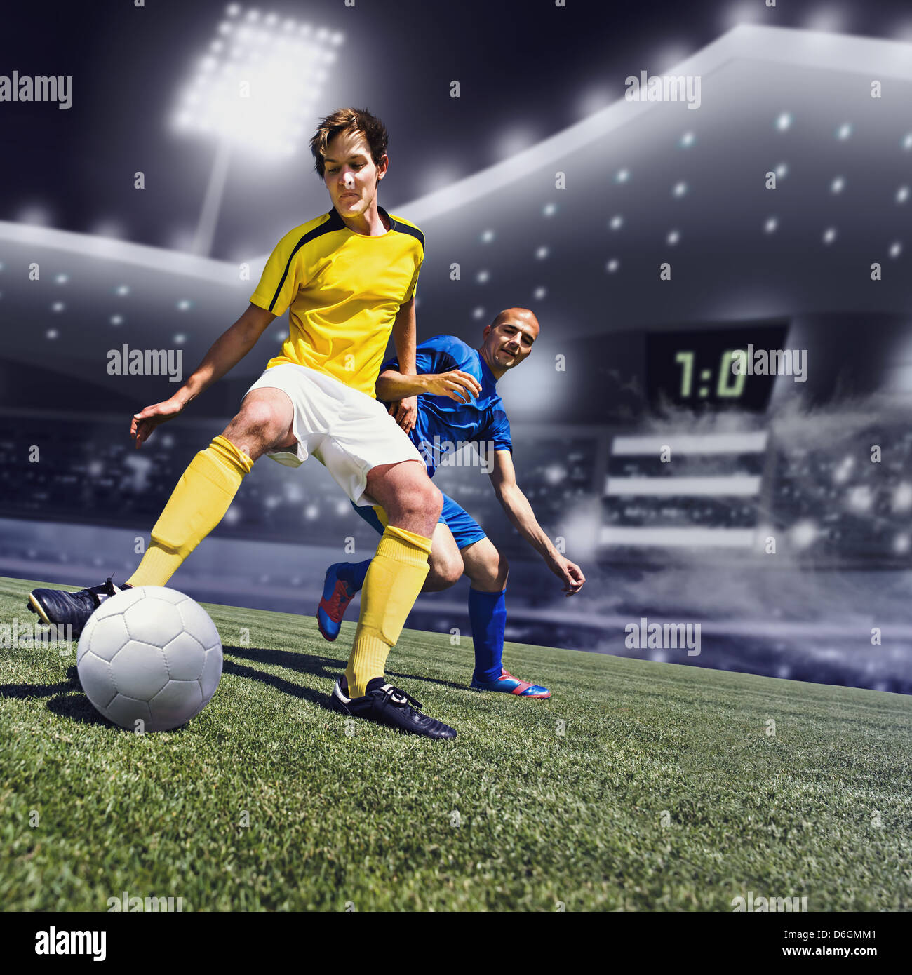 two football players from opposing team on the field Stock Photo - Alamy