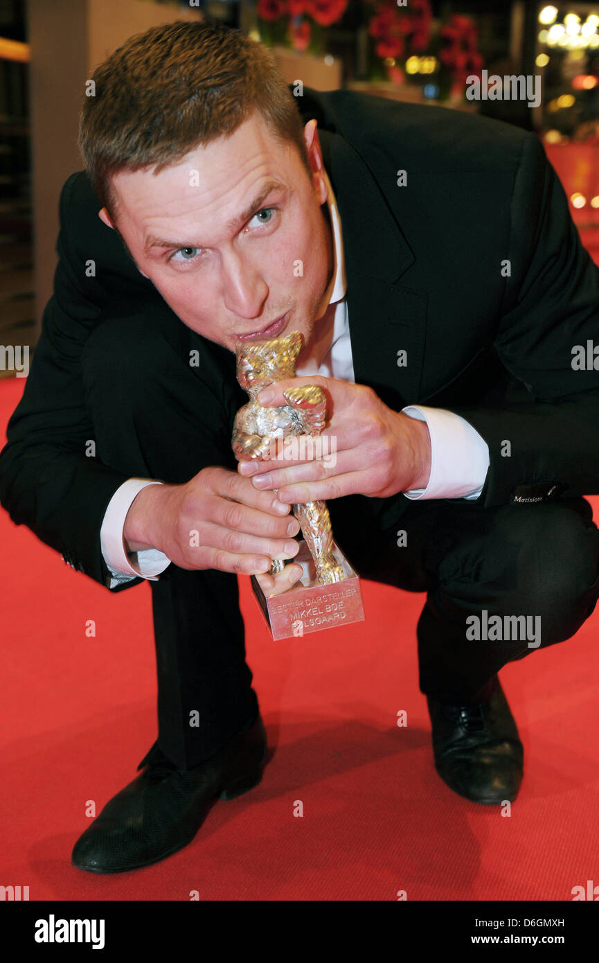 Actor Mikkel Boe Folsgaard poses with the Award for Best Actor (Silver ...