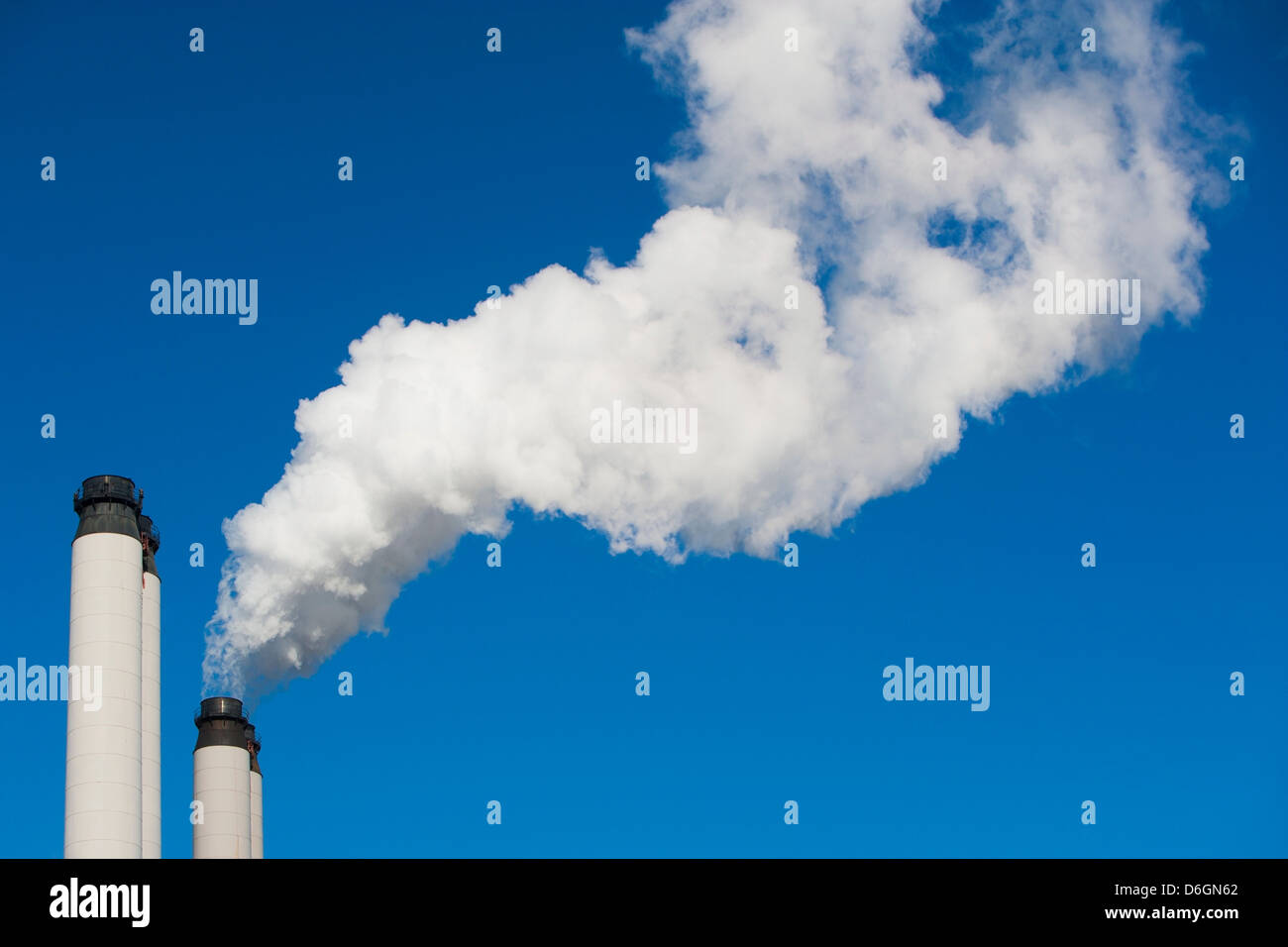 Smoke billowing from industrial plant Stock Photo - Alamy