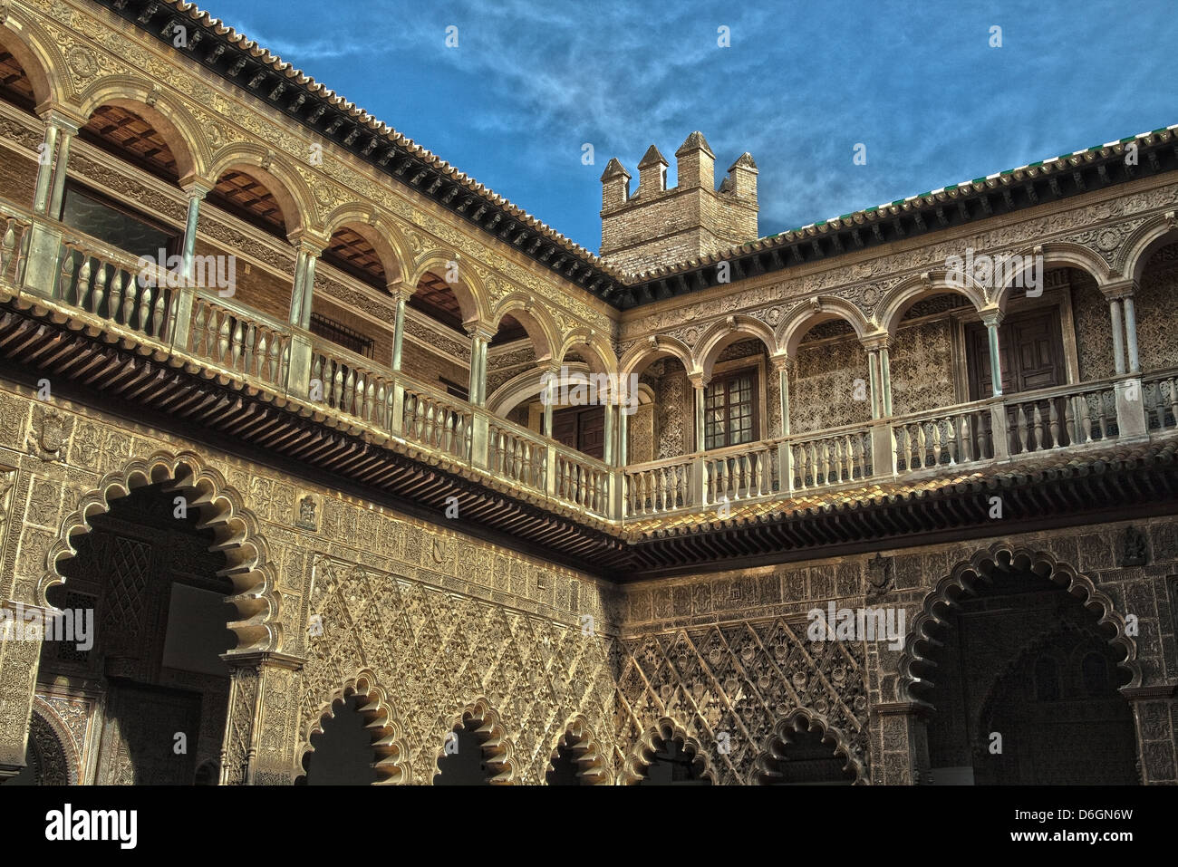 Detail of a courtyard in the Alcazar Reales in Seville Stock Photo - Alamy