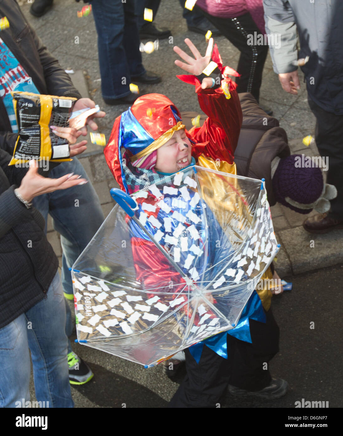 A child tries to catch sweets during the Carnival Monday parade in ...
