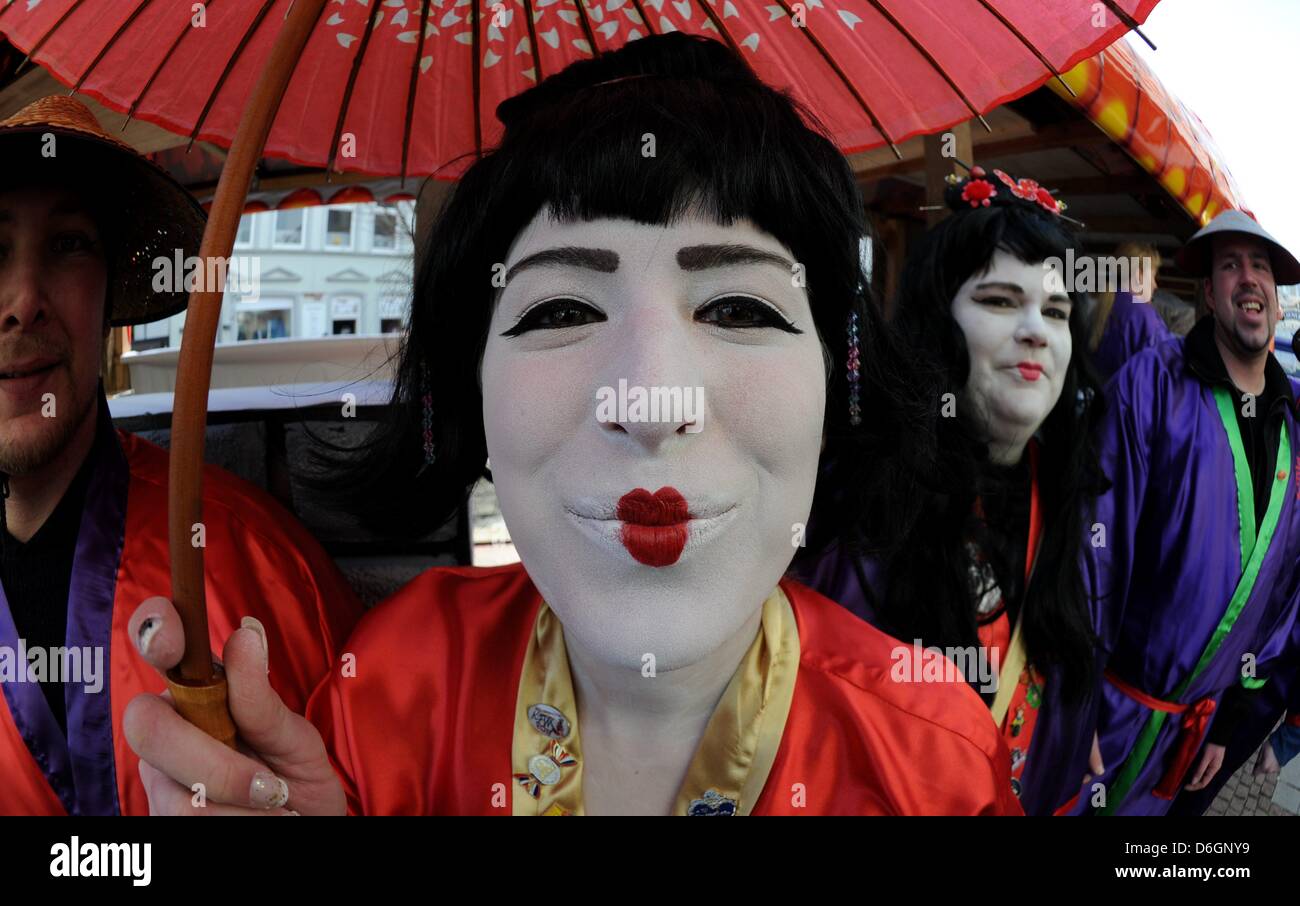 A woman costumed as a Geisha participates in Germany's northernmost ...