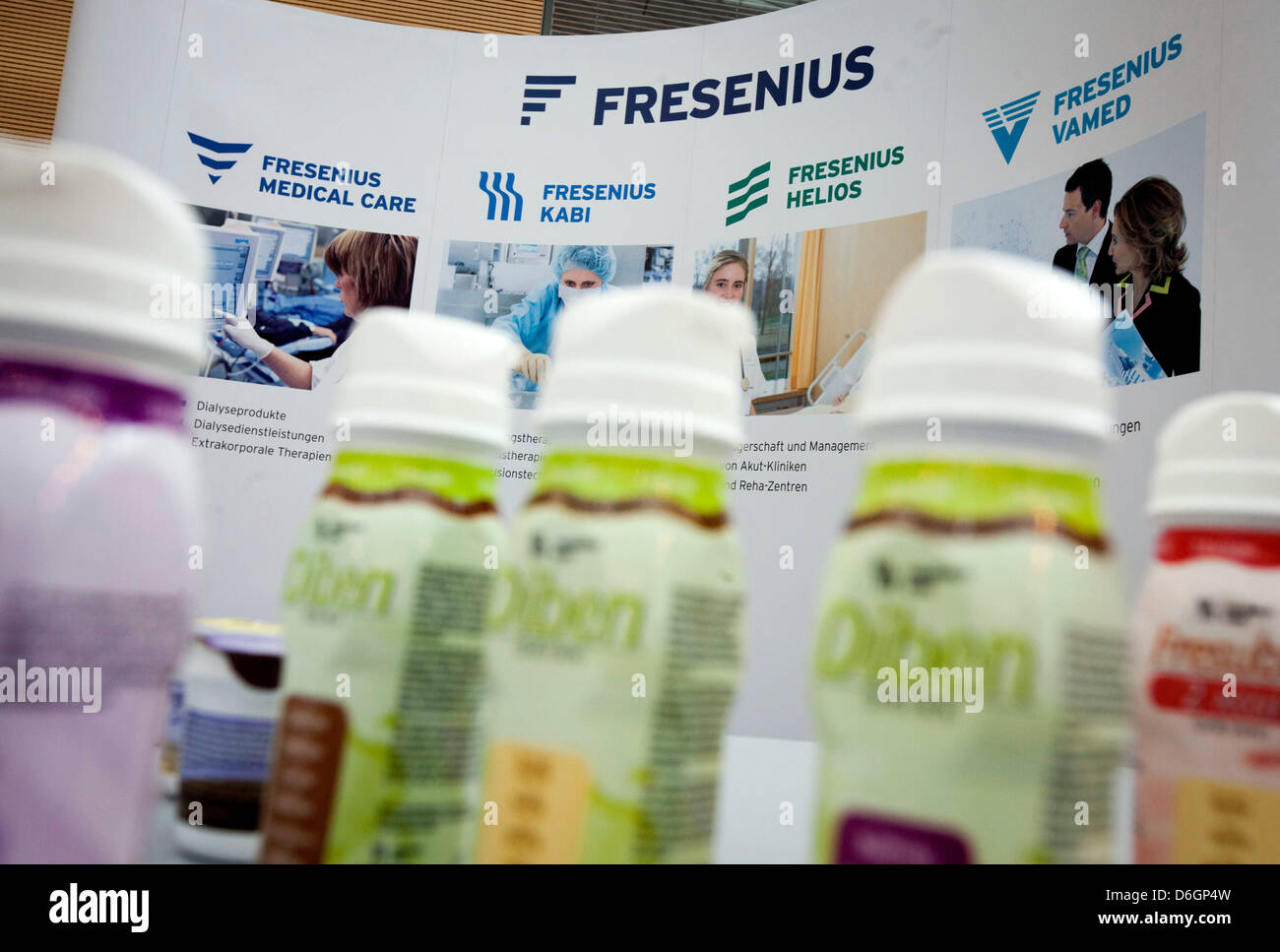 An advertising banner is on display at a Fresenius press conference on ...