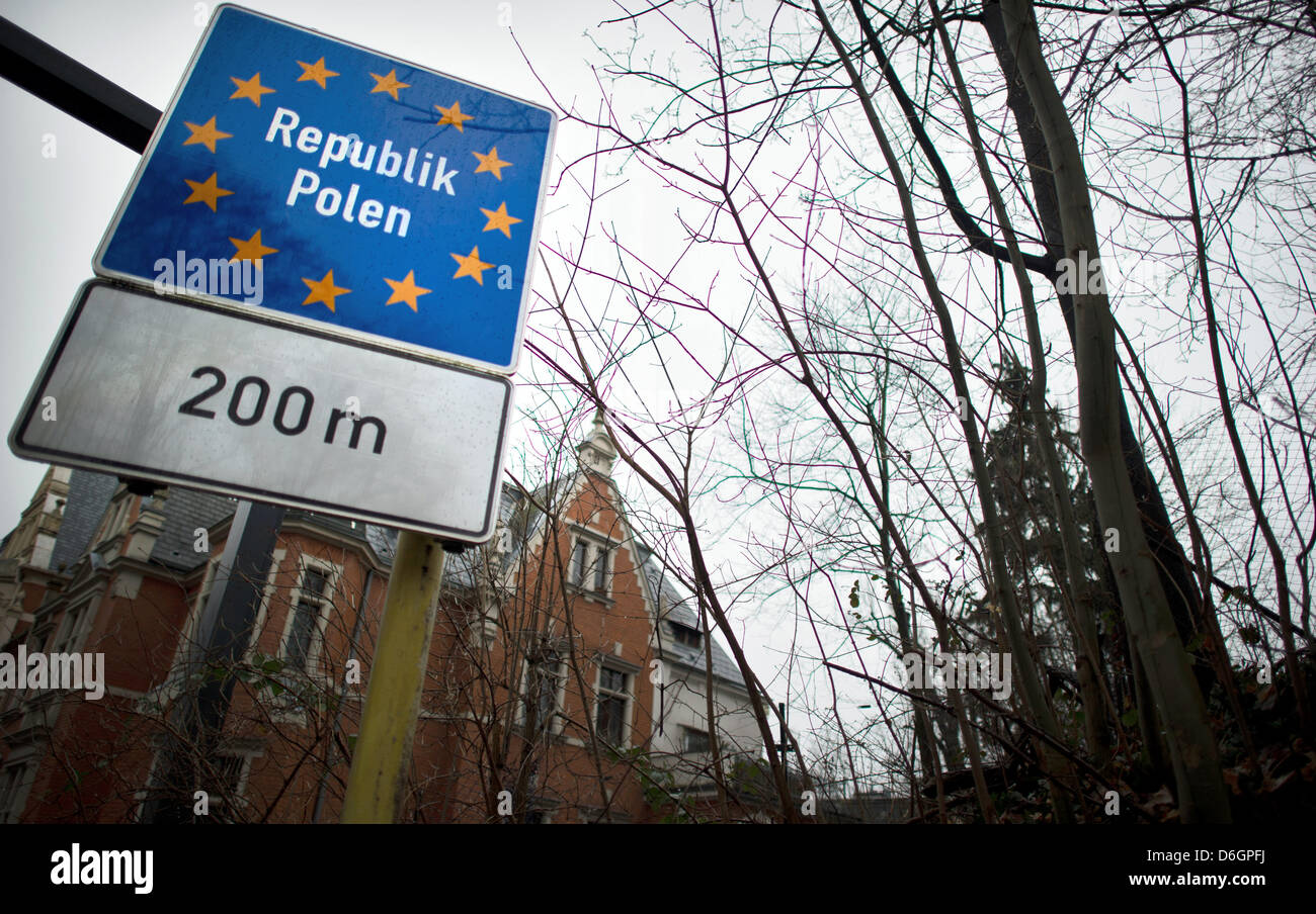 A "Republic of Poland" European sign stands on the German-Polish border ...