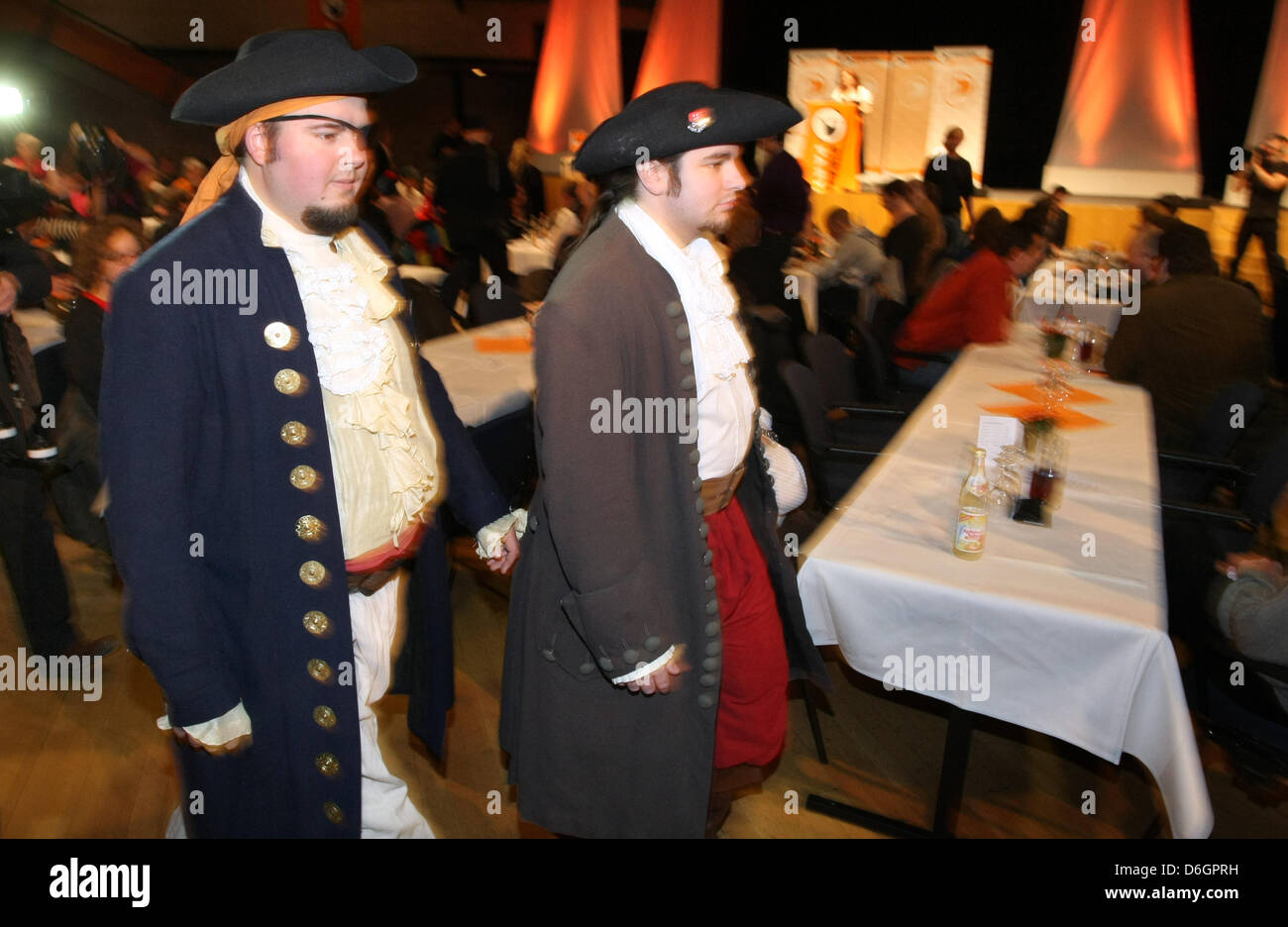 Members of the Pirate Party dressed as pirates enter the hall before ...