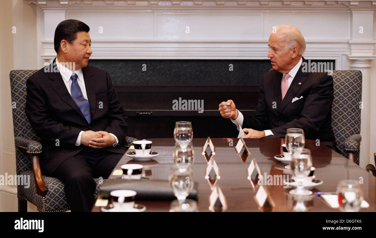 United States Vice President Joe Biden (R) and Vice President Xi ...