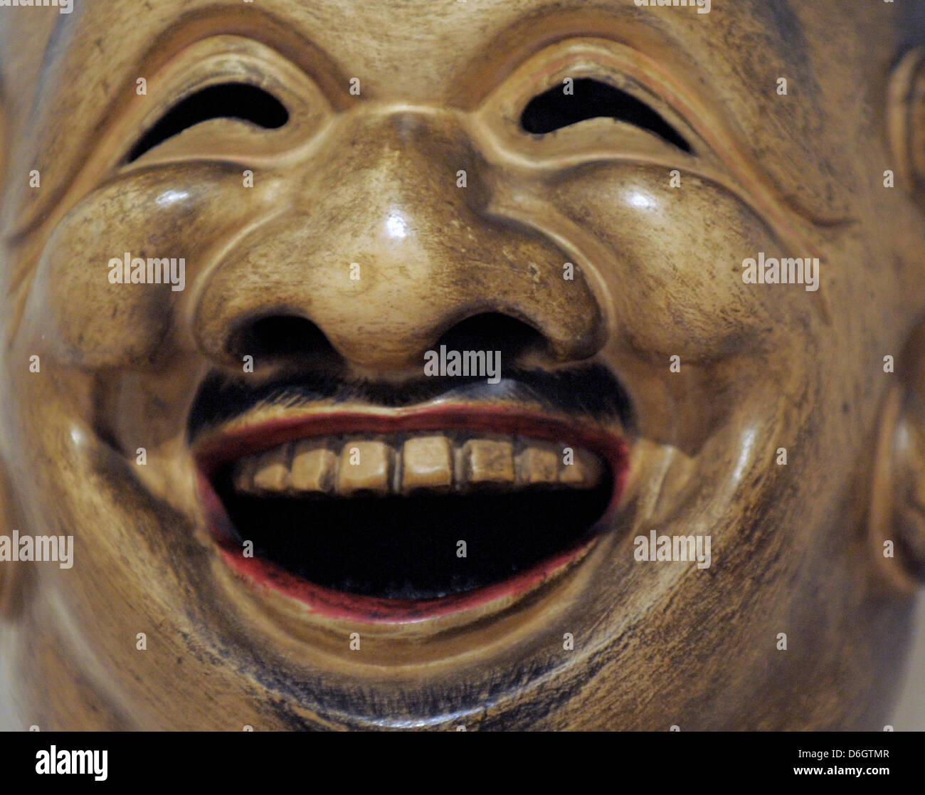 The Japanese mask 'Ebisu' symbolising joy is presented during the new ...