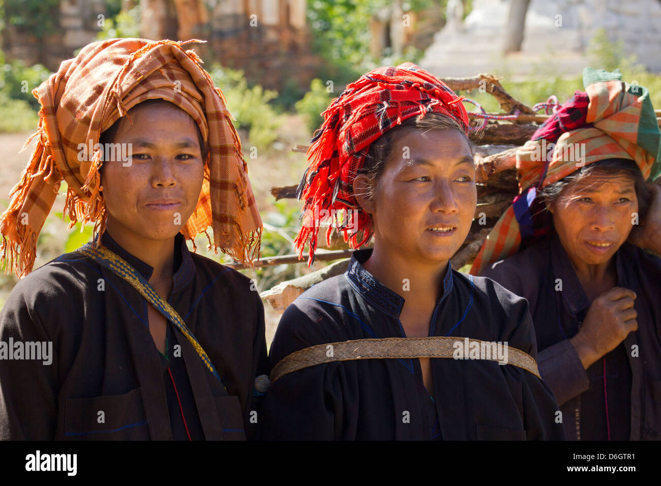 Three tribal women at the abandoned Inn Thein Pagoda Complex in Myanmar ...