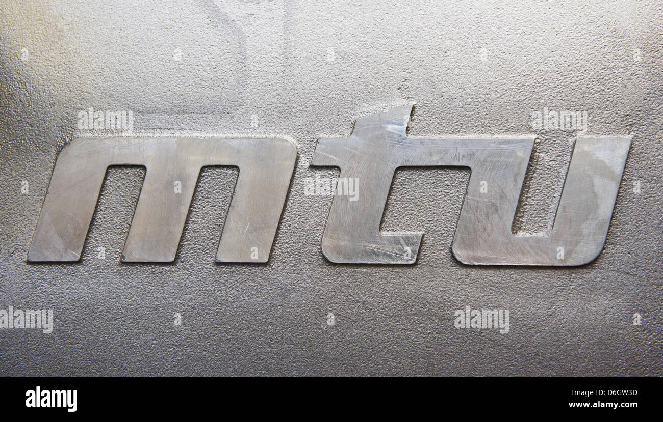 The MTU logo appears raised and polished on a piece of metal at the MTU ...