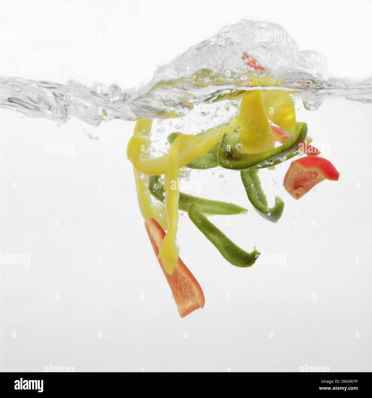 Green bell pepper splashing water hi-res stock photography and images ...