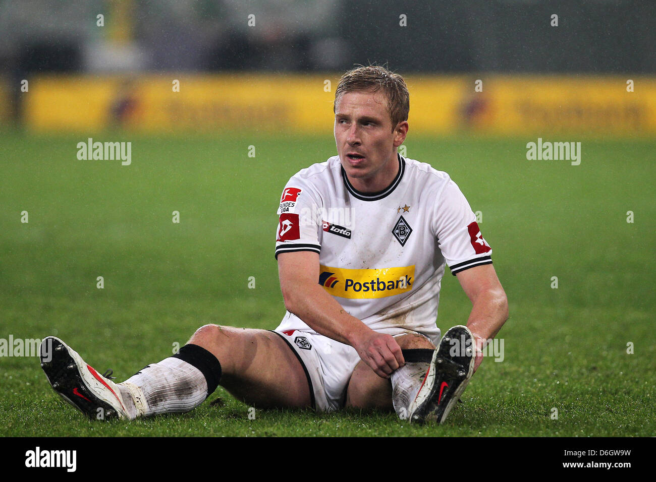 Moenchengladbach's Mike Hanke sits on the ground during the German ...