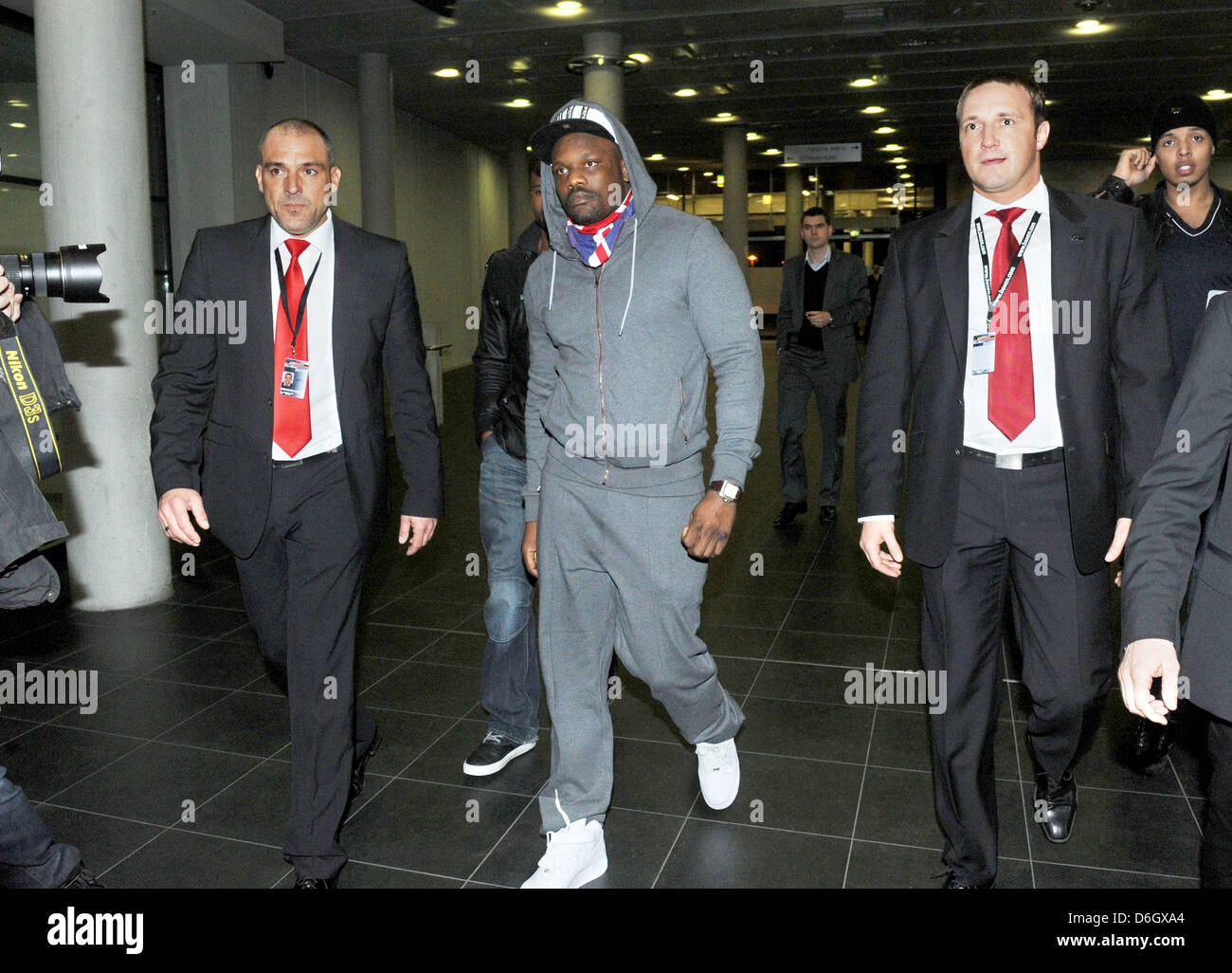 British boxer Dereck Chisora (C) arrives at the Porsche-Arena prior to ...