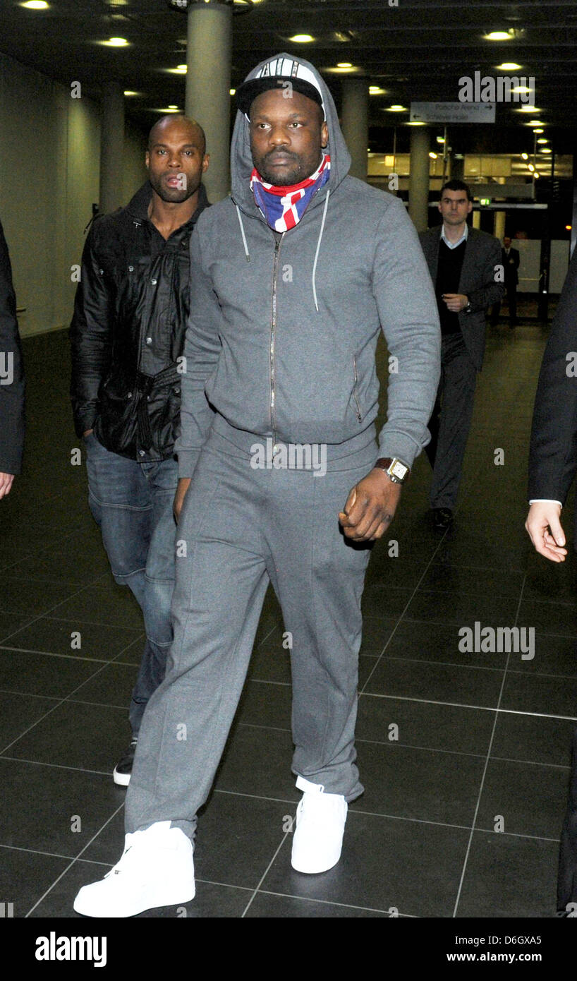 British boxer Dereck Chisora (C) arrives at the Porsche-Arena prior to ...