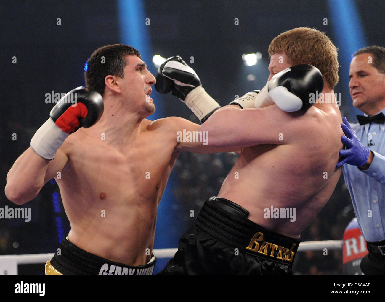 German boxer Marco Huck (L) fights against Russian boxer Alexander ...