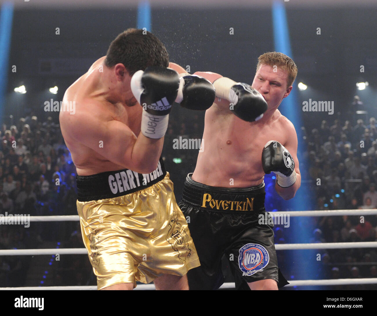 German boxer Marco Huck (L) fights against Russian boxer Alexander ...