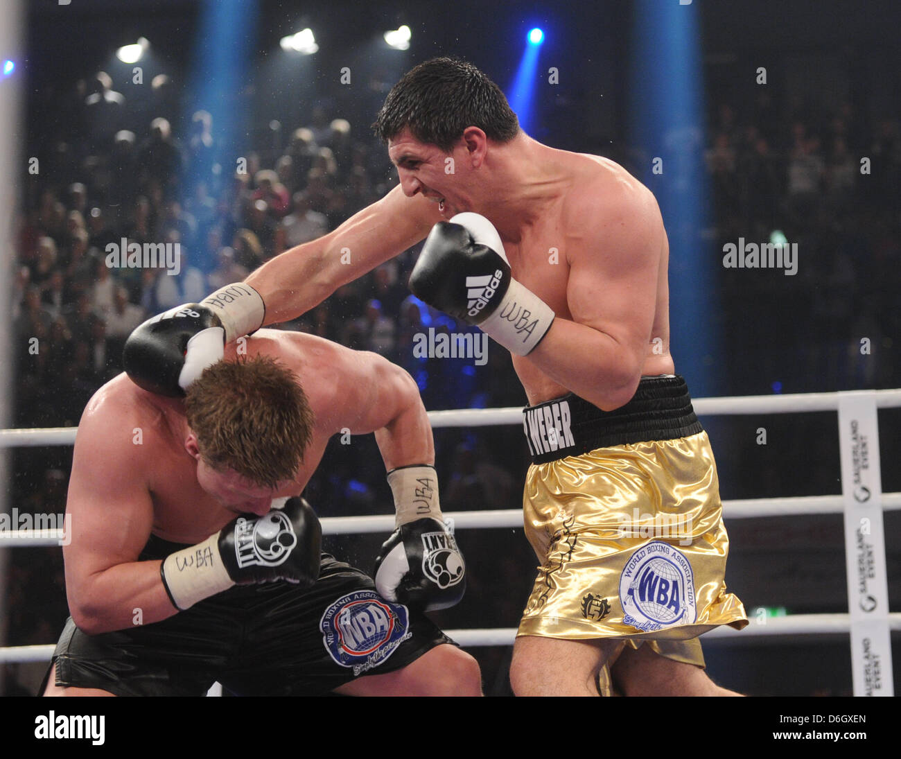 German boxer Marco Huck (R) fights against Russian boxer Alexander ...