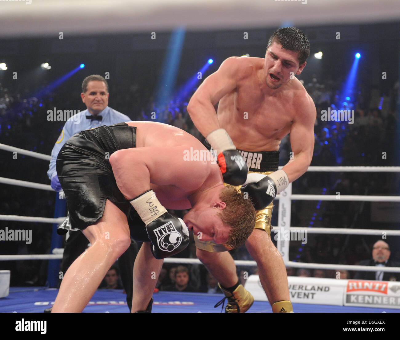 German boxer Marco Huck (R) fights against Russian boxer Alexander ...