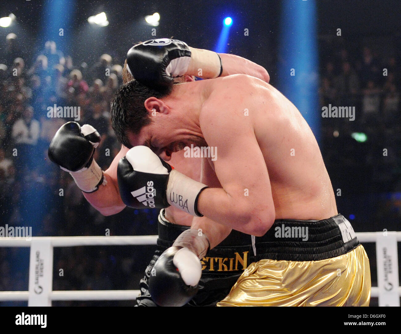 German boxer Marco Huck (front) fights against Russian boxer Alexander ...