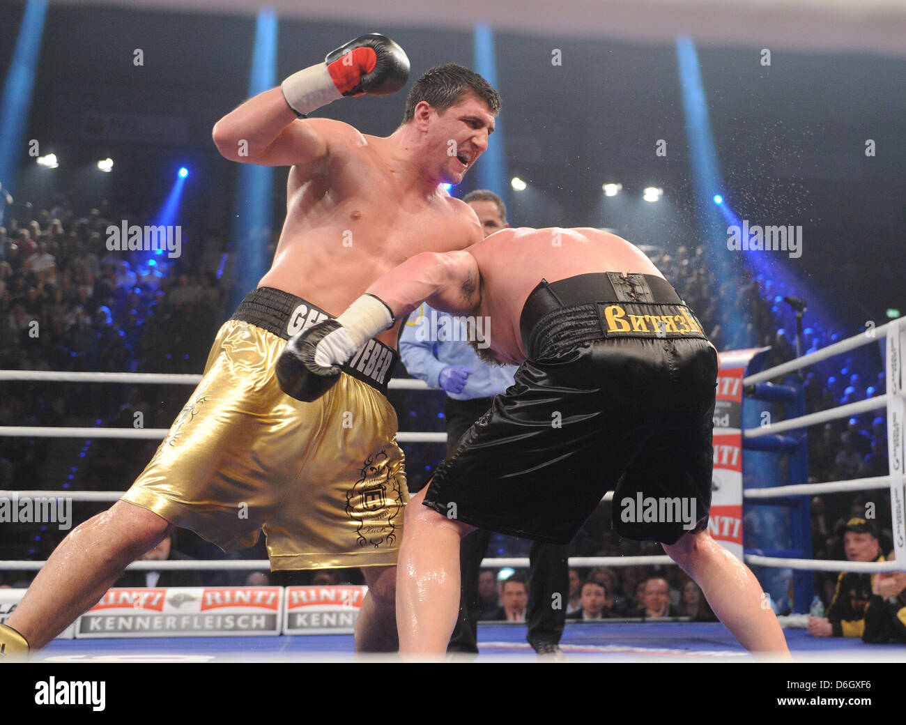 German boxer Marco Huck (L) fights against Russian boxer Alexander ...