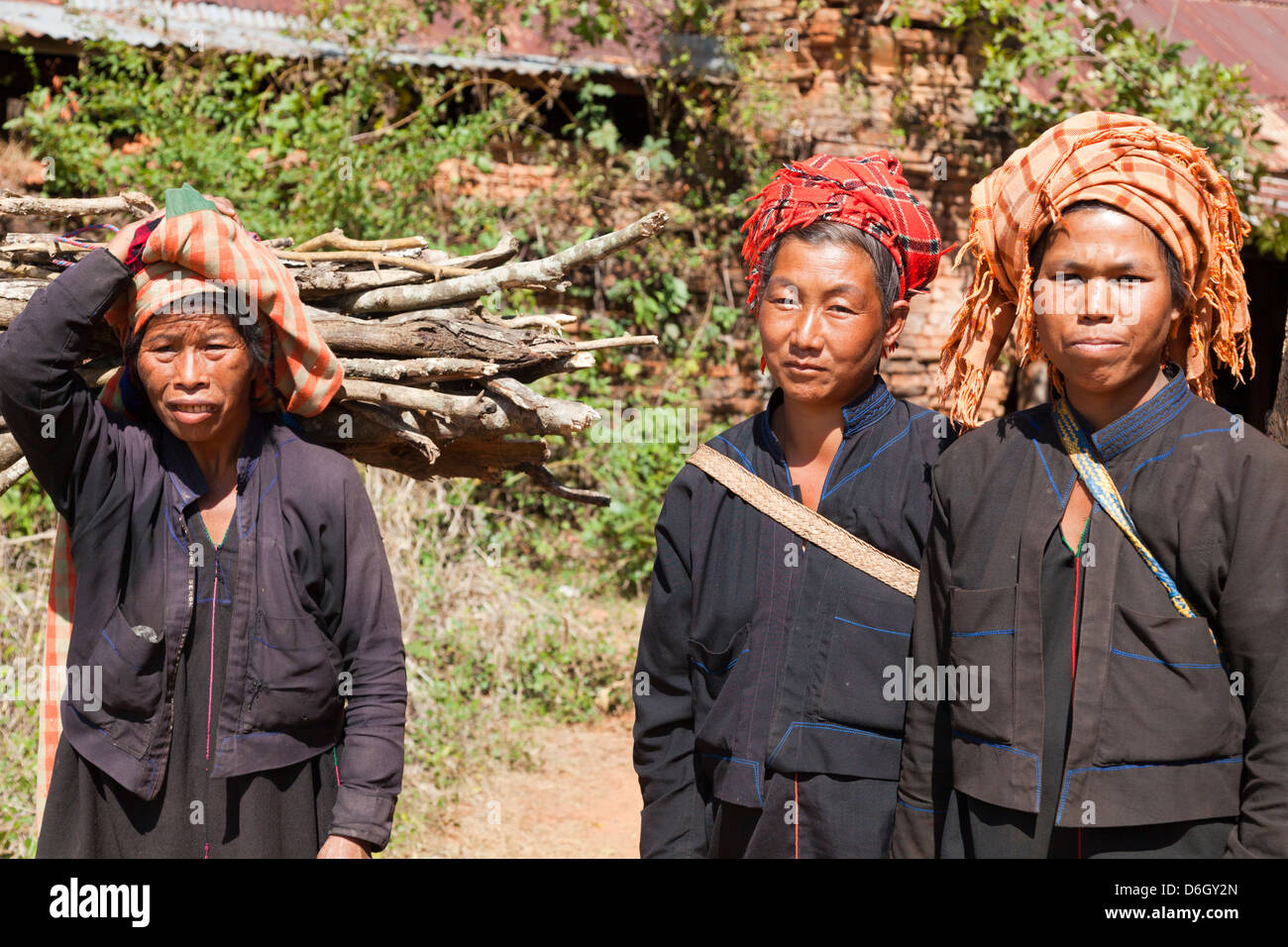 Three tribal women at the abandoned Inn Thein Pagoda Complex in Myanmar ...