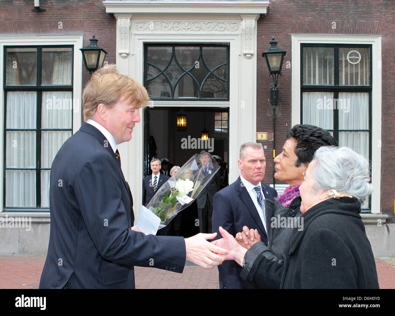 Crown Prince Willem-Alexander of the Netherlands (L) receives a white ...