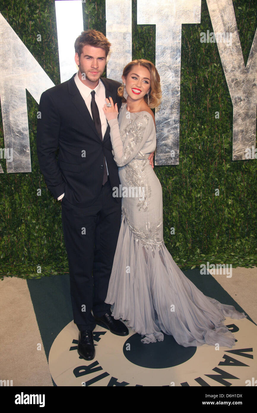 US actress and singer Miley Cyrus and her boyfriend Liam Hemsworth ...