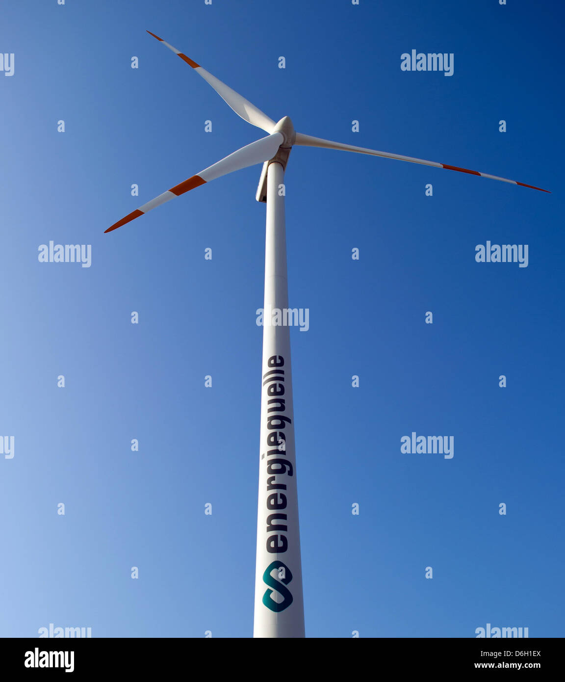 A wind turbine designed with the lettering 'infinite source of energy ...