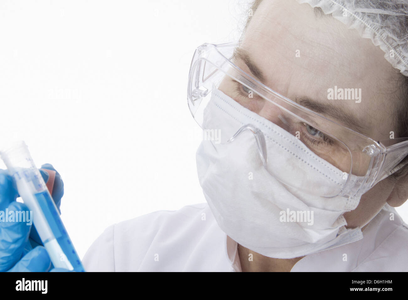 Doctor in mask looking down hi-res stock photography and images - Alamy