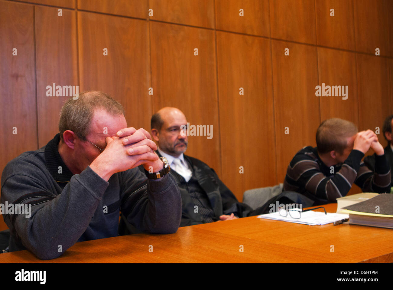 The defendants Christian H. (L) and Dennis H. (R) sit in the docks next ...