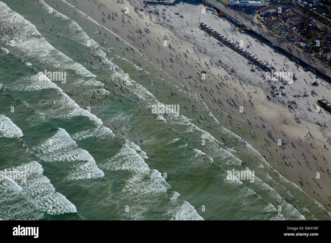 People swimming at Muizenberg Beach, Cape Town, South Africa - aerial ...