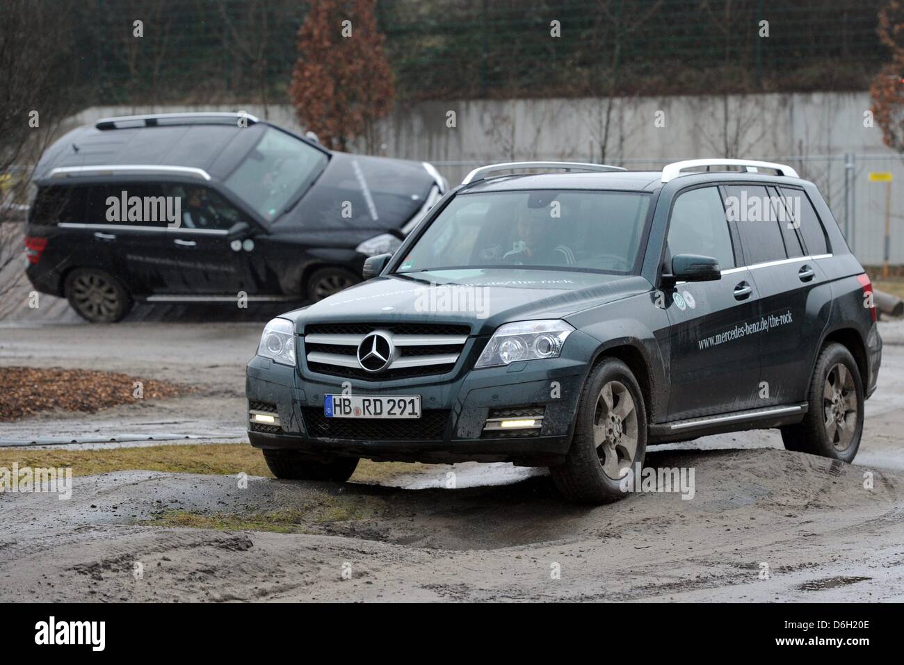 German national players drive along the Mercedes Benz Offroad-Parcours ...