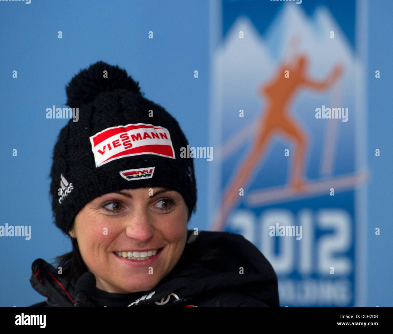 German biathlete Andrea Henkel talks during a press conference in ...
