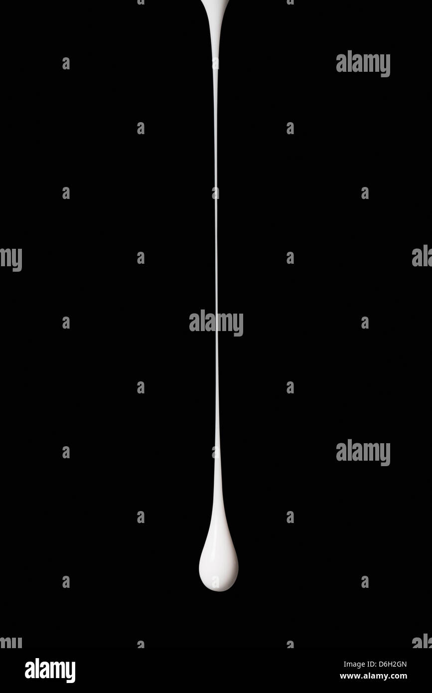 Drop of white paint Stock Photo - Alamy