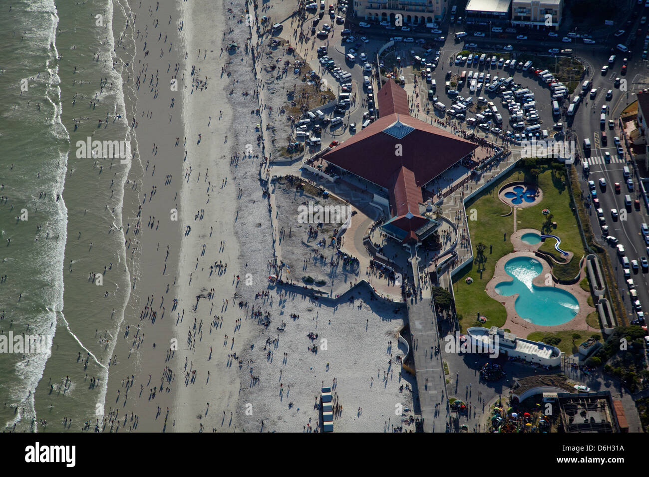 People swimming at Muizenberg Beach, Cape Town, South Africa - aerial ...