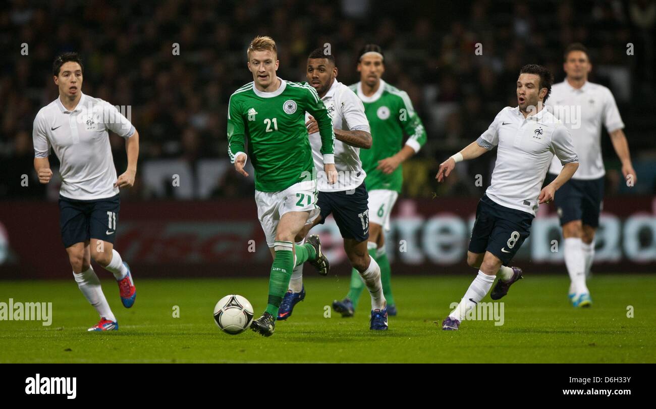 Germany's Marco Reus (C) and Samir Nasri (L-R), Yann M'Vila and Mathieu ...